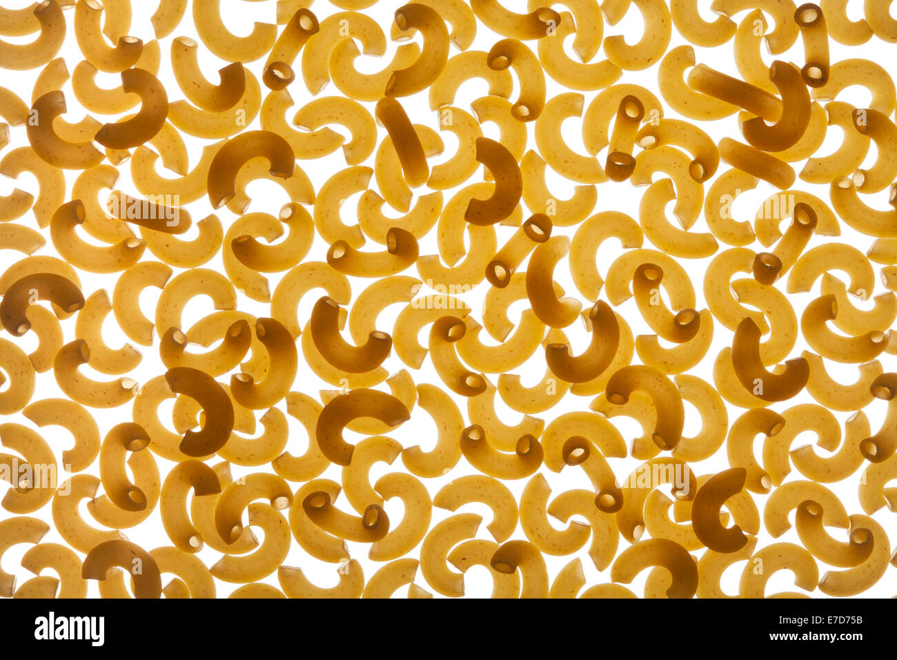 Italian raw pasta cornetti background, close up Stock Photo - Alamy