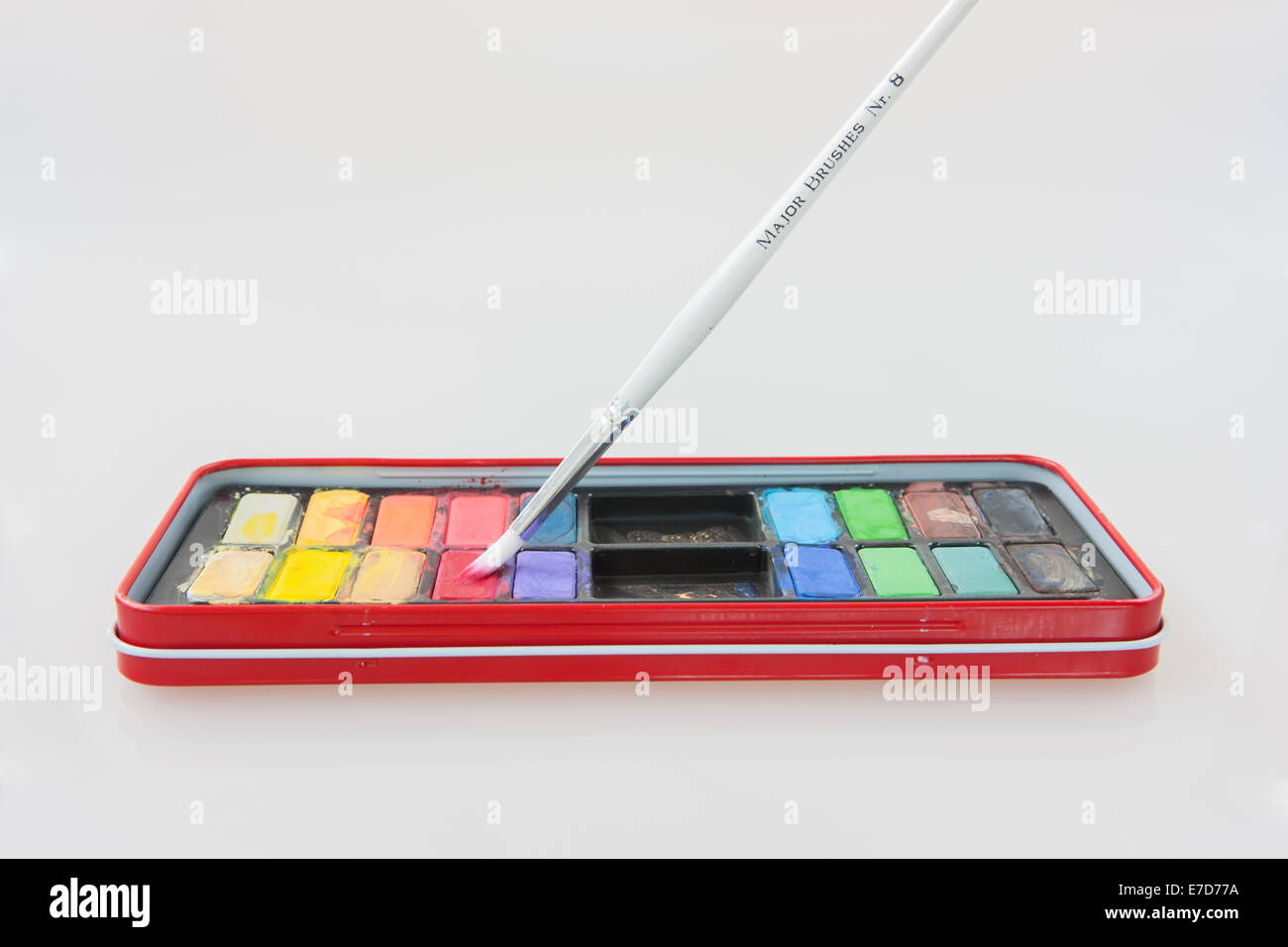 Mixing paint with a brush hi-res stock photography and images - Alamy