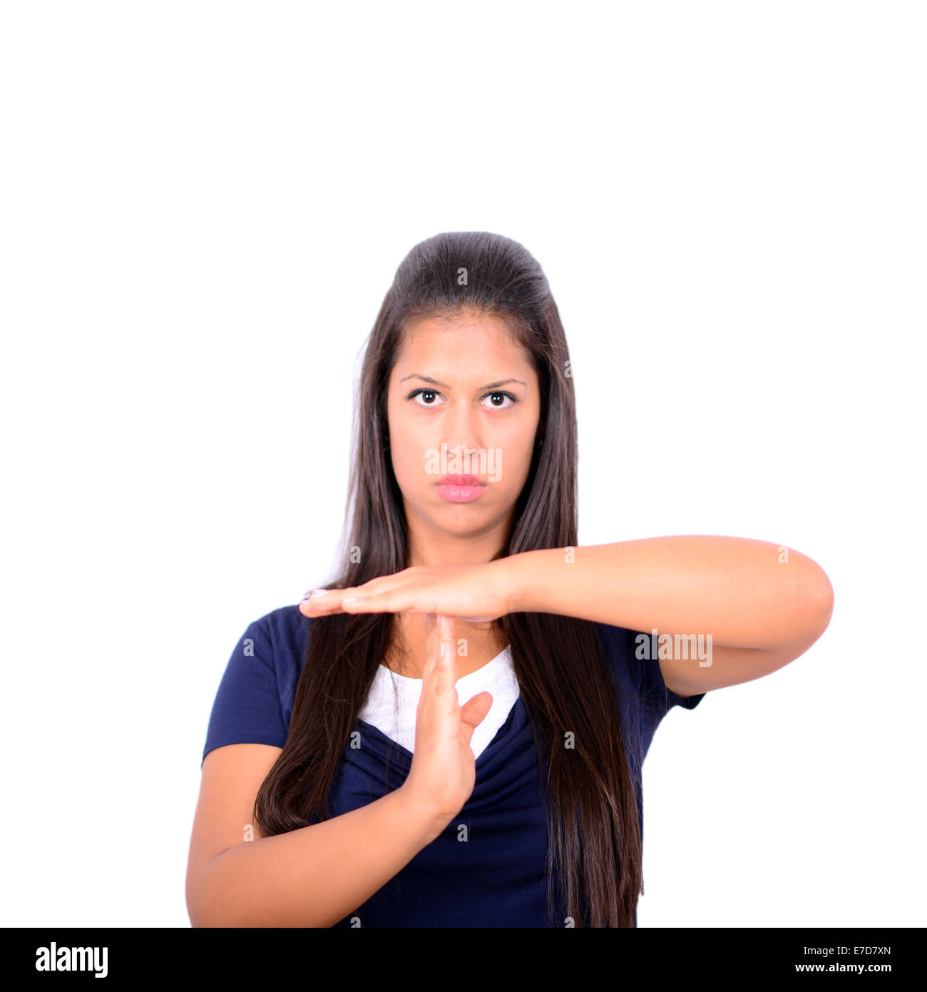 Young girl making time out gesture over white background Stock Photo ...