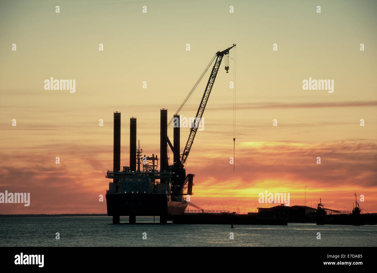 Large crane at sunset Stock Photo - Alamy