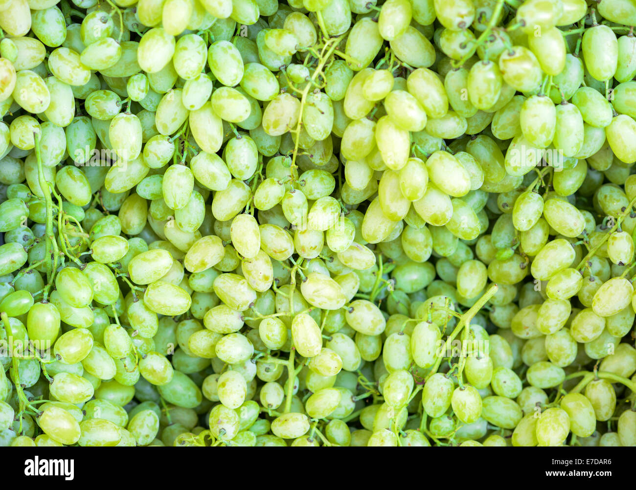Green grapes background Stock Photo - Alamy