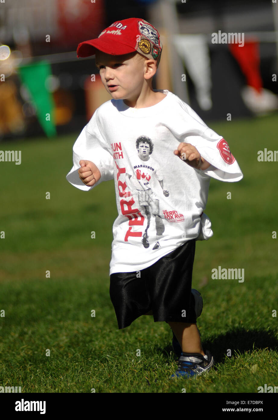 Vancouver, Canada. 14th Sep, 2014. A boy runs in The Terry Fox Run 2014 ...