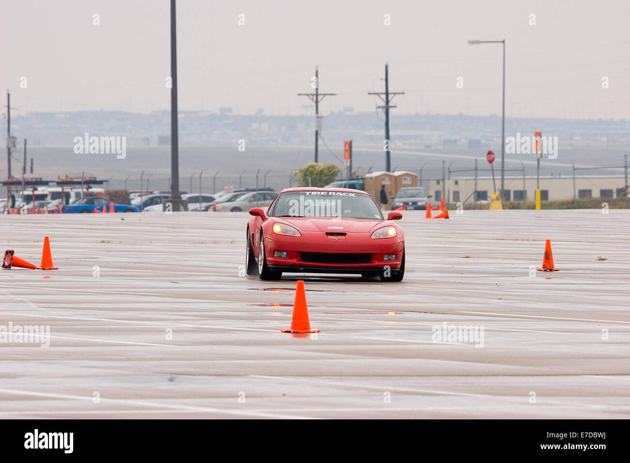 A 2006 Red Chevrolet Corvette Z06 in an autocross race at a regional ...
