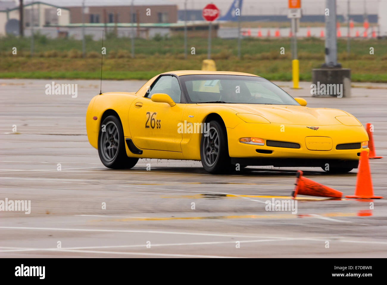 A 2001 Yellow Chevrolet Corvette Z06 in an autocross race at a regional ...
