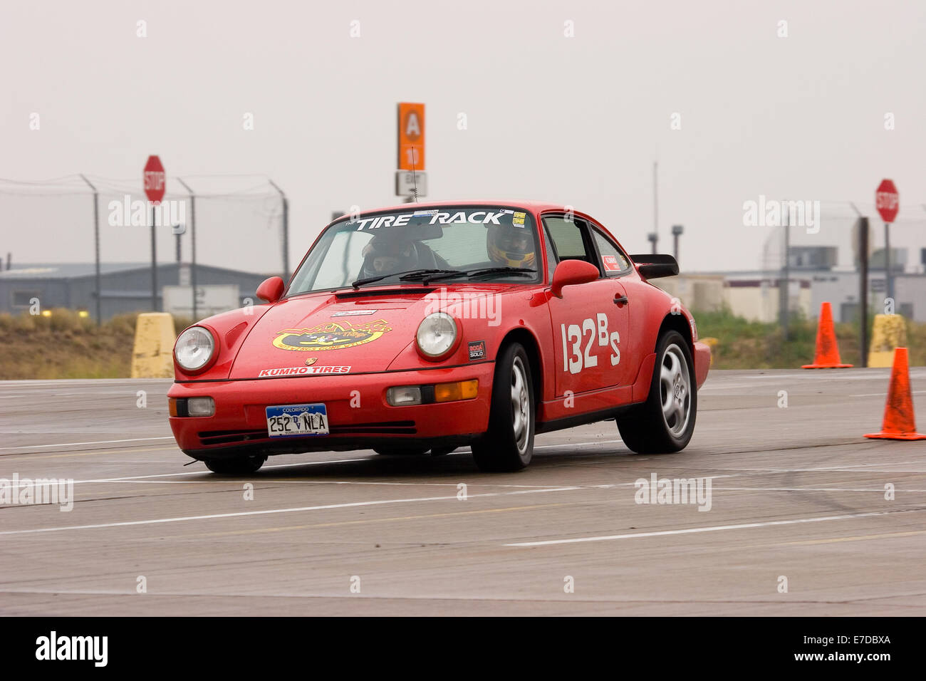 A 1993 Red Porsche 911 in an autocross race at a regional Sports Car ...