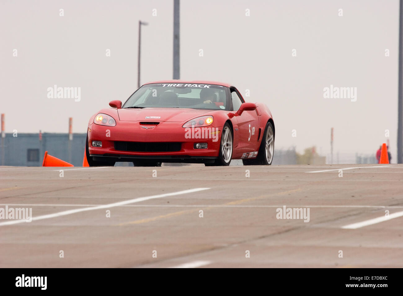 A 2006 Red Chevrolet Corvette Z06 in an autocross race at a regional ...