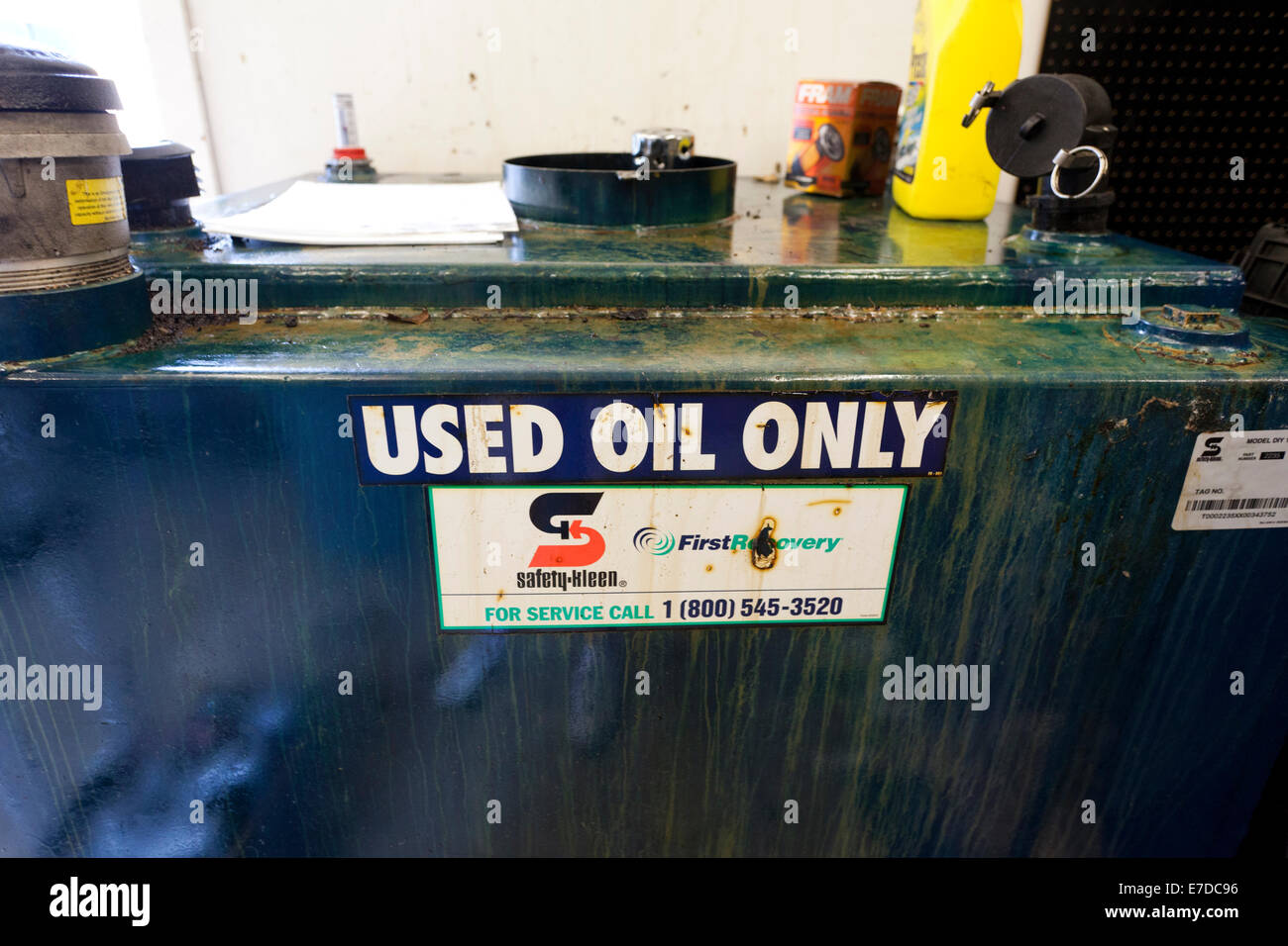 Used motor oil collection tank at auto parts store - USA Stock Photo ...