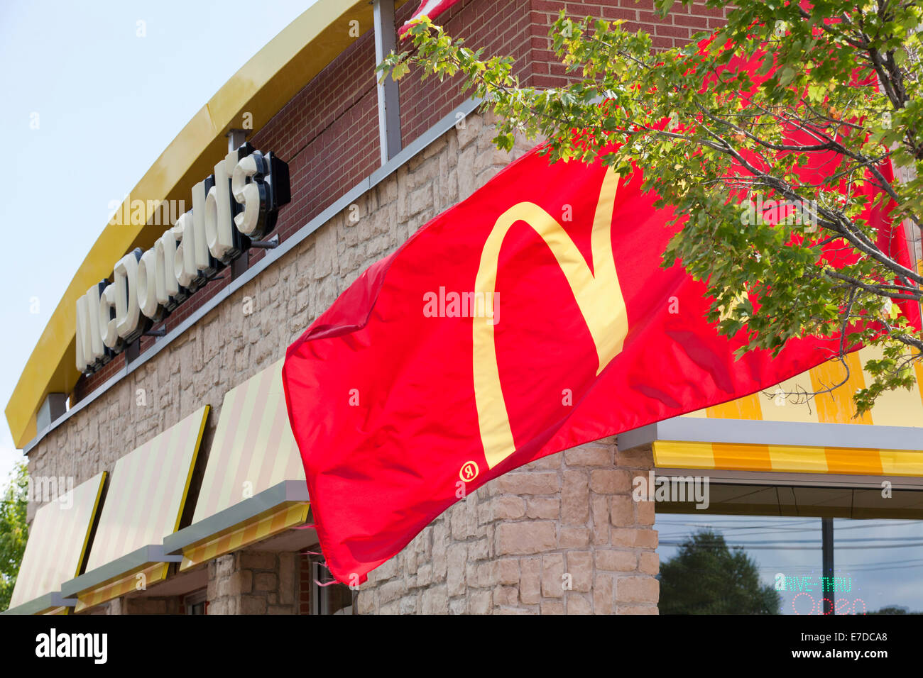 McDonalds flag on restaurant storefront - USA Stock Photo - Alamy