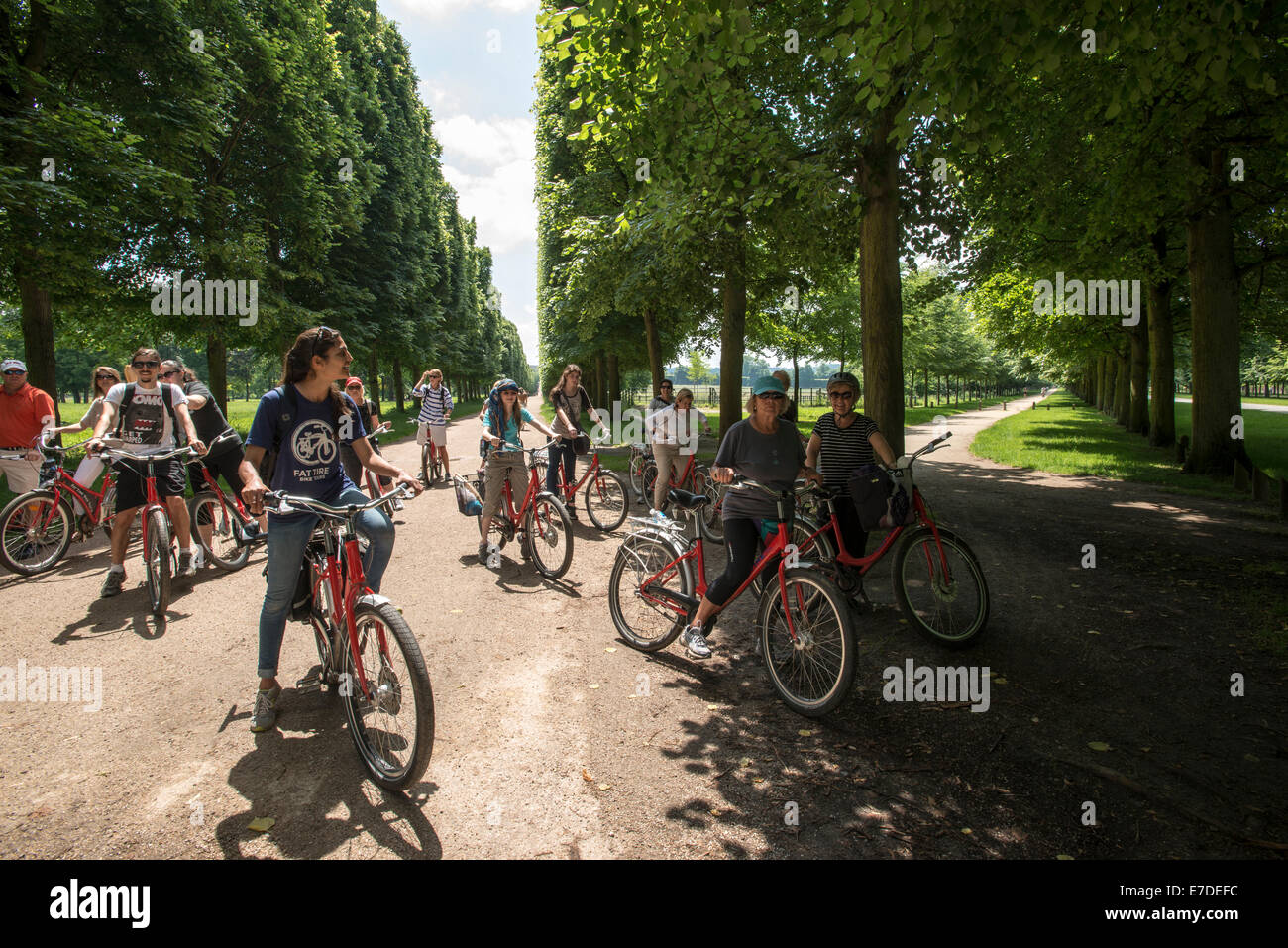 Group of people riding bike in Versailles Stock Photo - Alamy