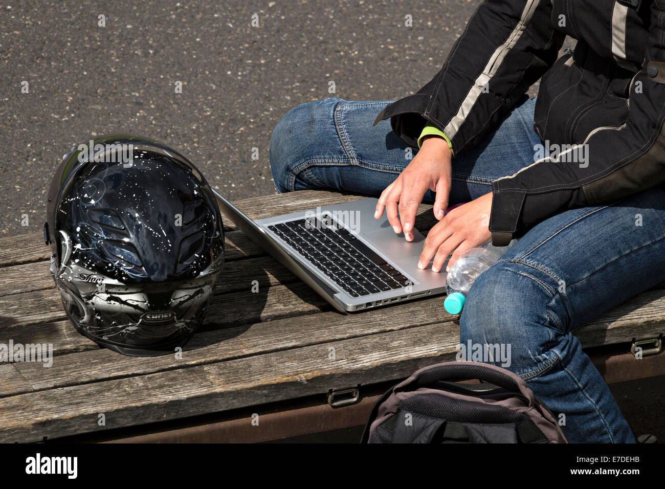 Person sitting a laptop hi-res stock photography and images - Alamy