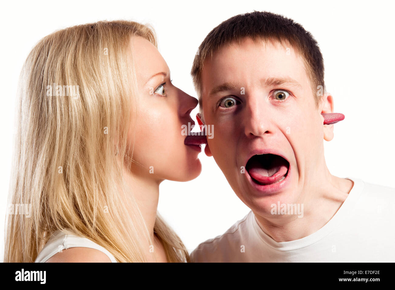 Woman push her tongue into man head Stock Photo - Alamy