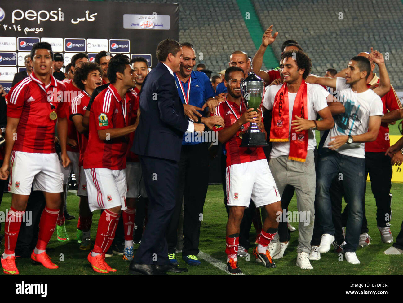 Al Ahly players celebrate with their trophy after winning their ...