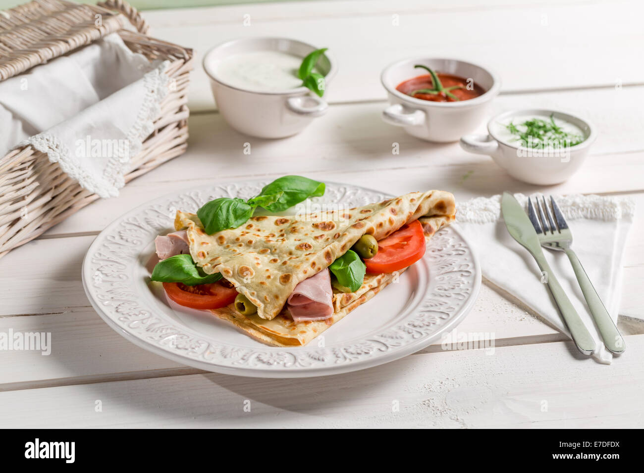 Tomato and ham pancake rolls hi-res stock photography and images - Alamy
