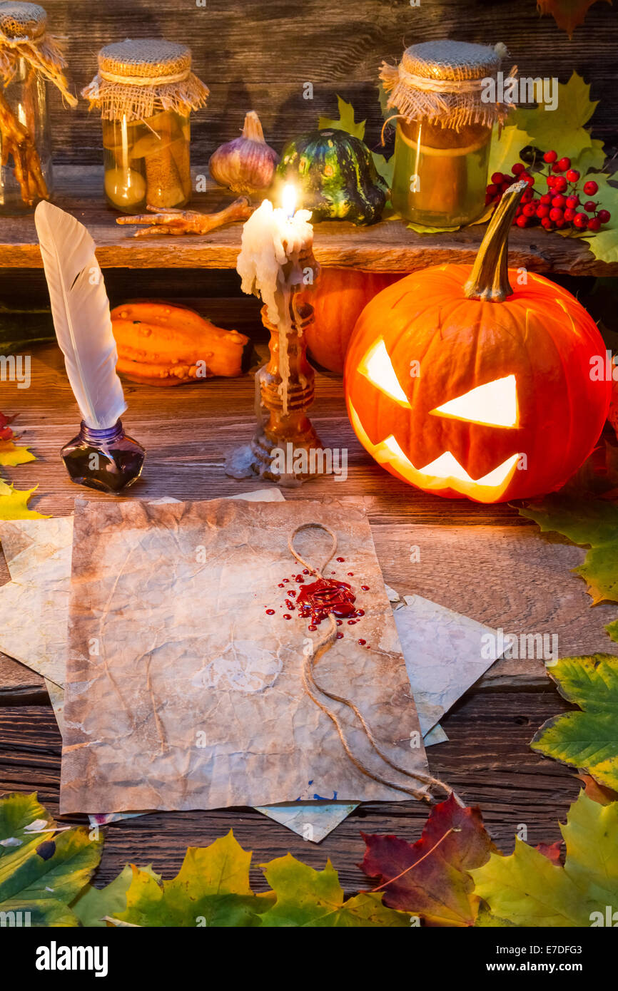 Table witches ready to write the scroll Stock Photo - Alamy