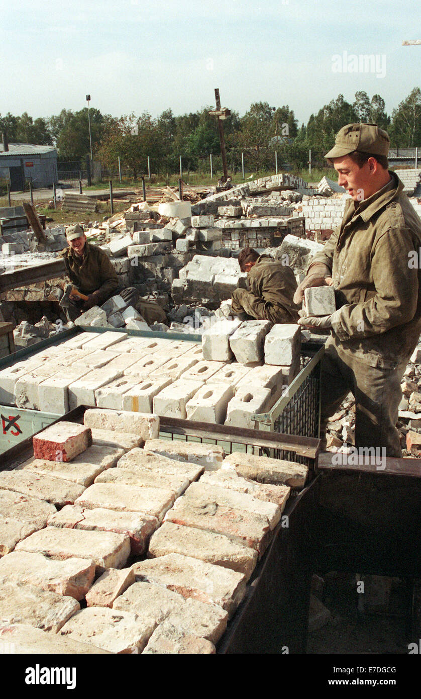 Russian soldiers prepare bricks for transport at the Russian garrison ...