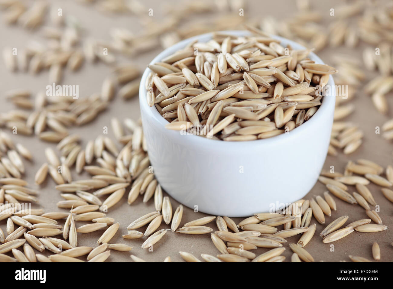 Oat grains in a bowl Stock Photo - Alamy