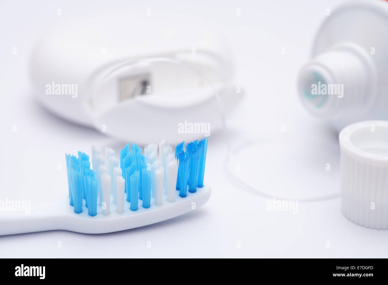 Close-up of toothbrush with toothpaste and dental floss. SDOF Stock ...