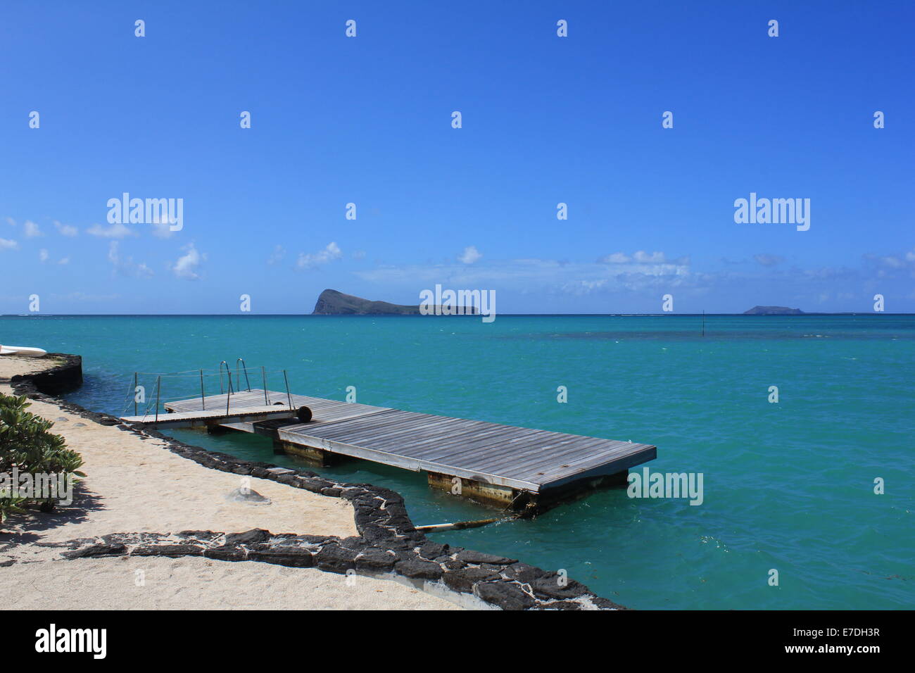small wooden jetty on the Mauritius coast Stock Photo - Alamy