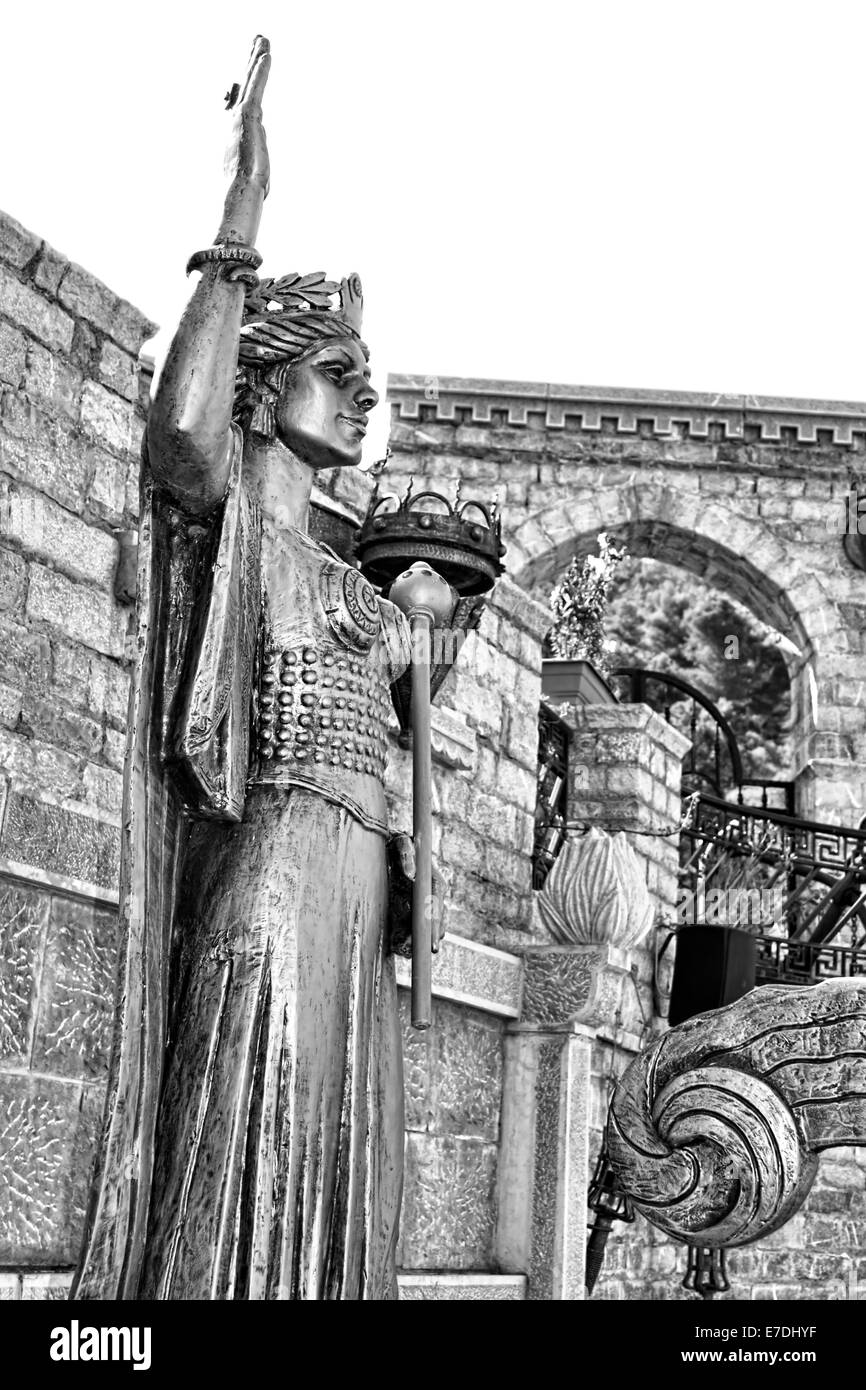Artistic sculpture of Illyria in front of stone wall BW Stock Photo - Alamy