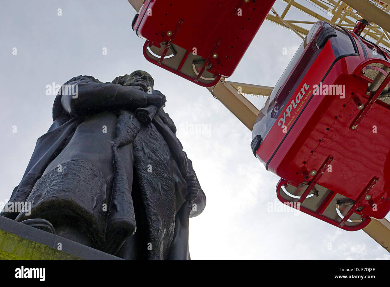 Statue of Adam Black overwelmed by Ferris wheel.UK Stock Photo - Alamy