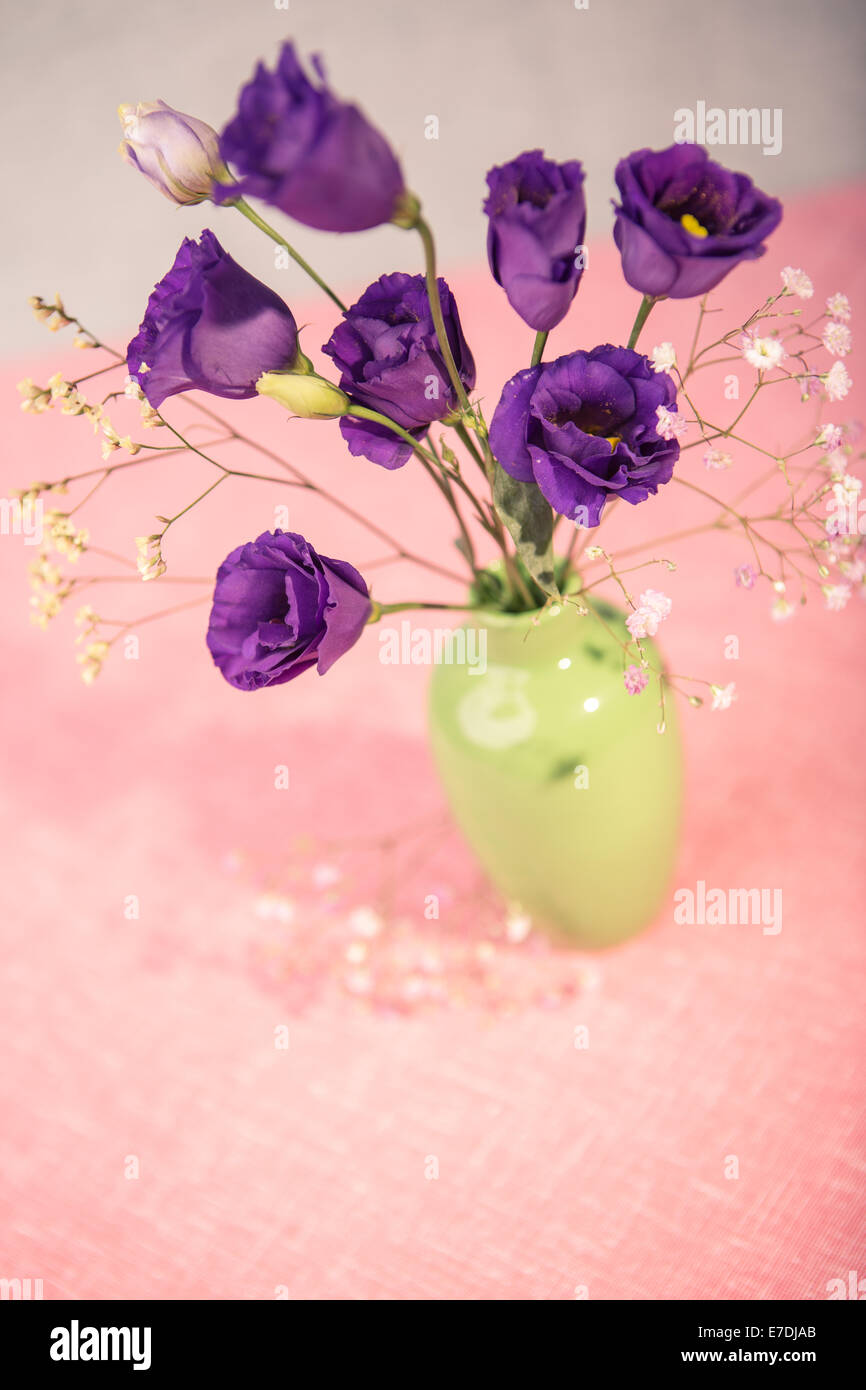 close up shot of Eustoma flowers in the vase Stock Photo - Alamy