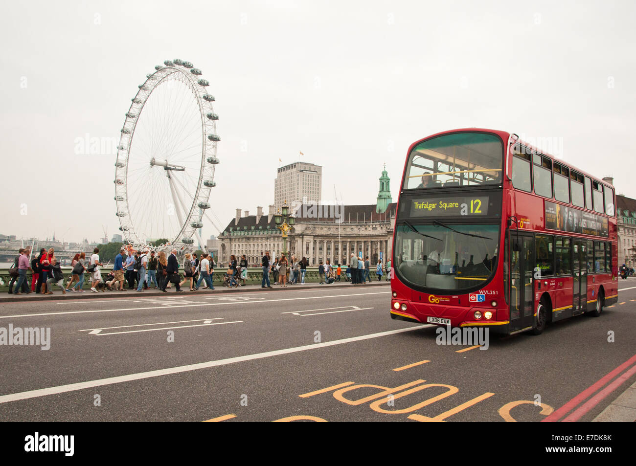 Red London Bus and the London Eye Stock Photo - Alamy