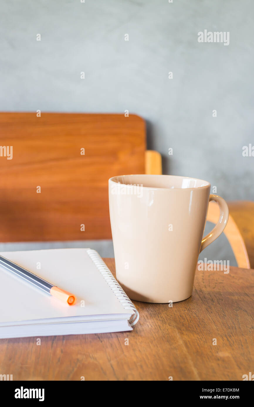 Beautiful wooden work table with cup of coffee, stock photo Stock Photo ...