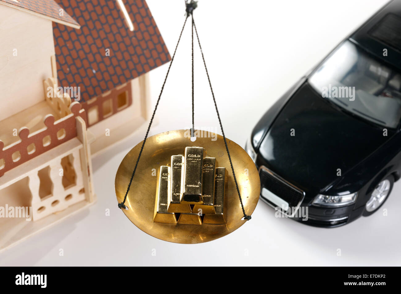 Architectural model,car model and gold bars Stock Photo - Alamy