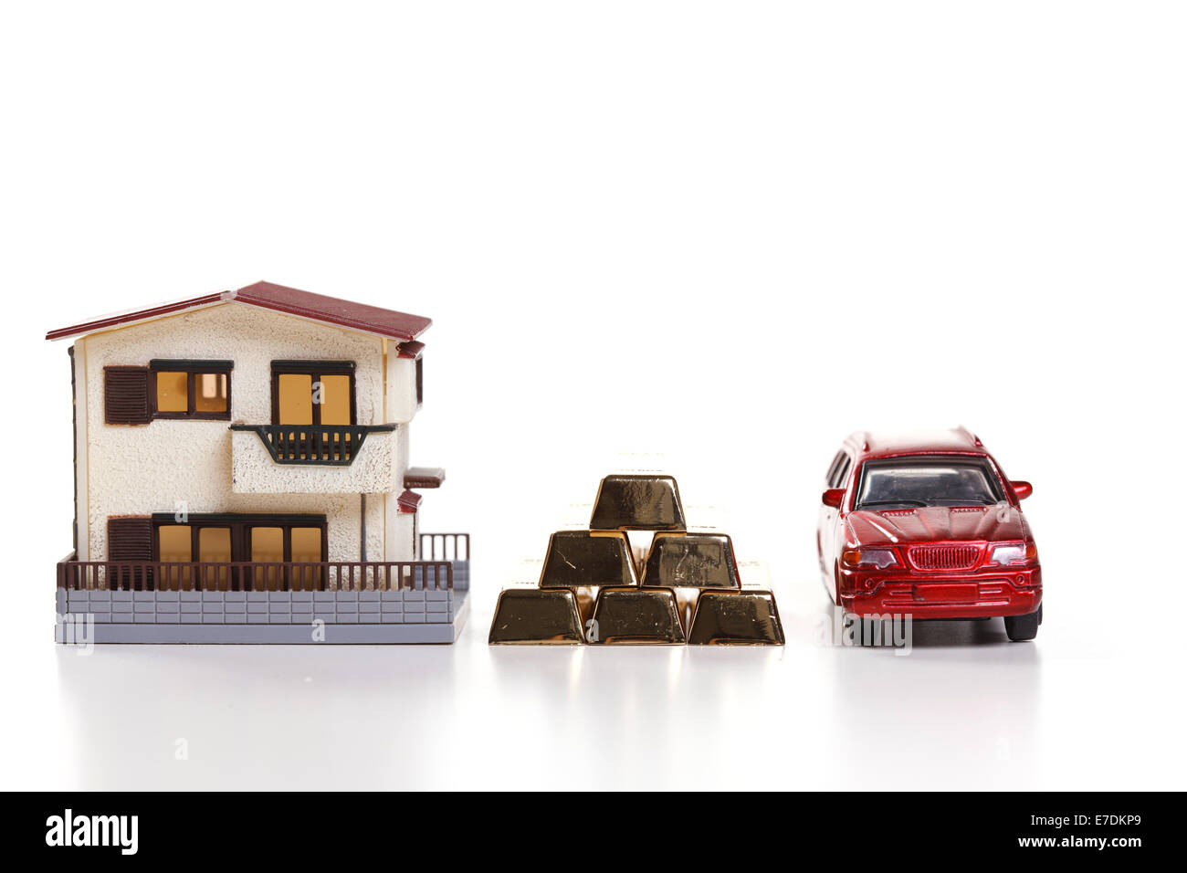 Architectural model,car model and gold bars Stock Photo - Alamy