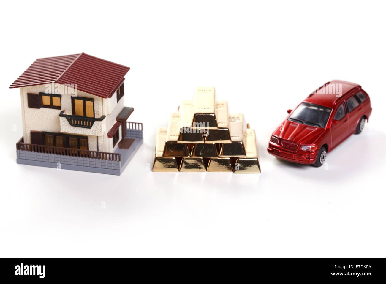 Architectural model,car model and gold bars Stock Photo - Alamy