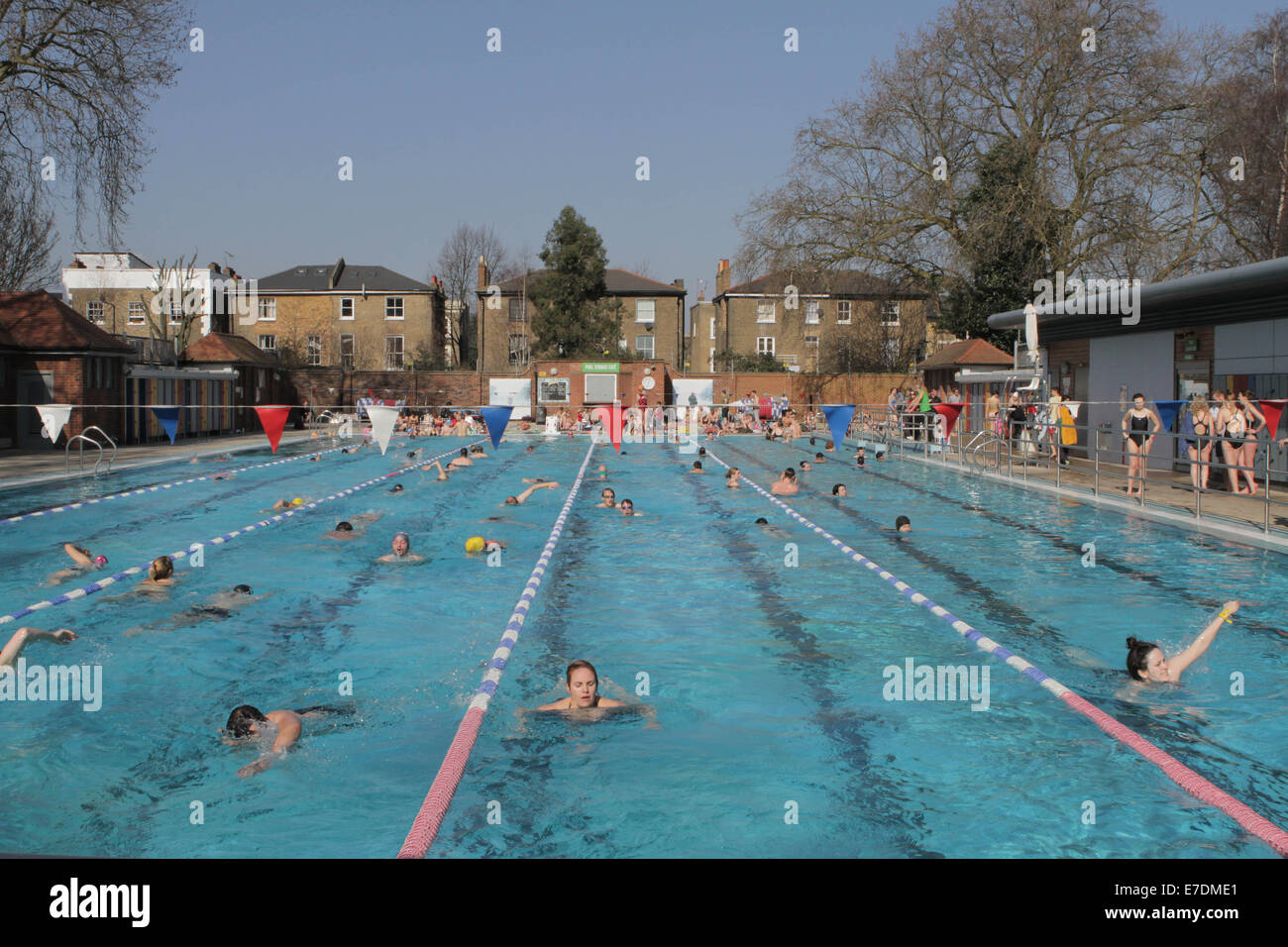 Londoners embrace the warm Spring weather Featuring: London Fields Lido ...