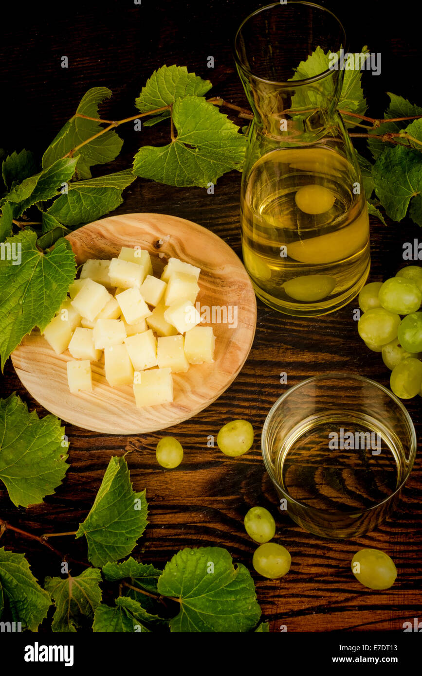 Diced cheese, grapes and white wine, a classic appetizer Stock Photo ...