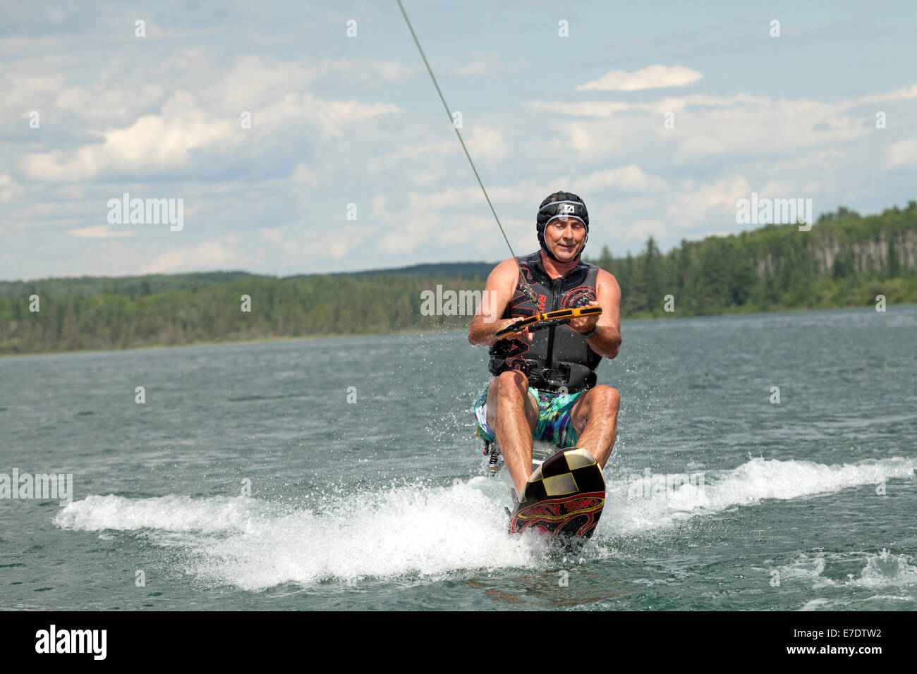 Man wakeboarding on Crane Lake, Alberta, Canada Stock Photo - Alamy