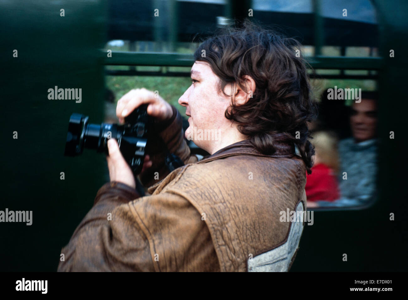 male using a 35mm film camera during the 1990s Stock Photo - Alamy