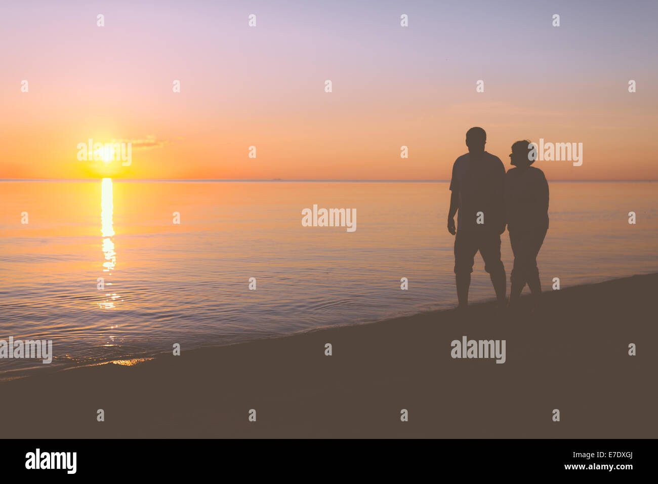 Senior couple walking along the beach Stock Photo - Alamy Senior couple walking along the beach Stock Photo - Alamy