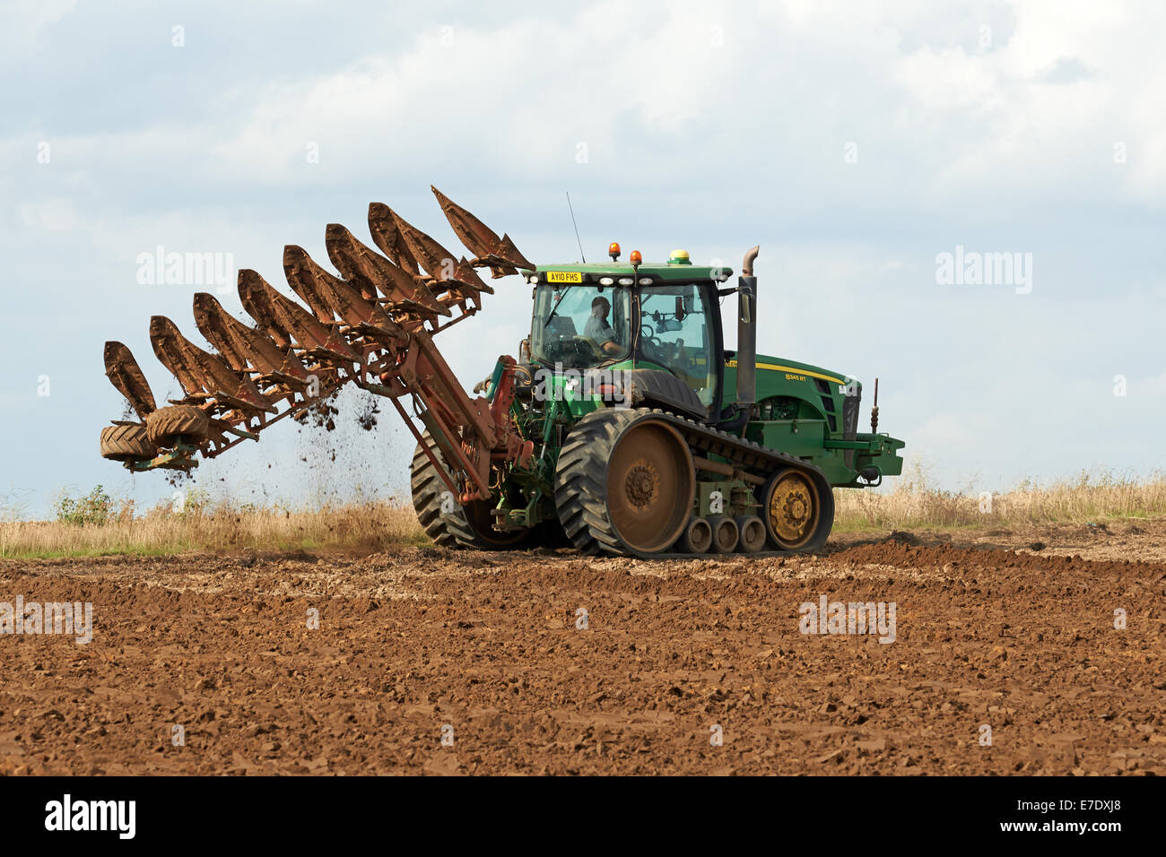 John Deere 8345 RT & plough Stock Photo - Alamy