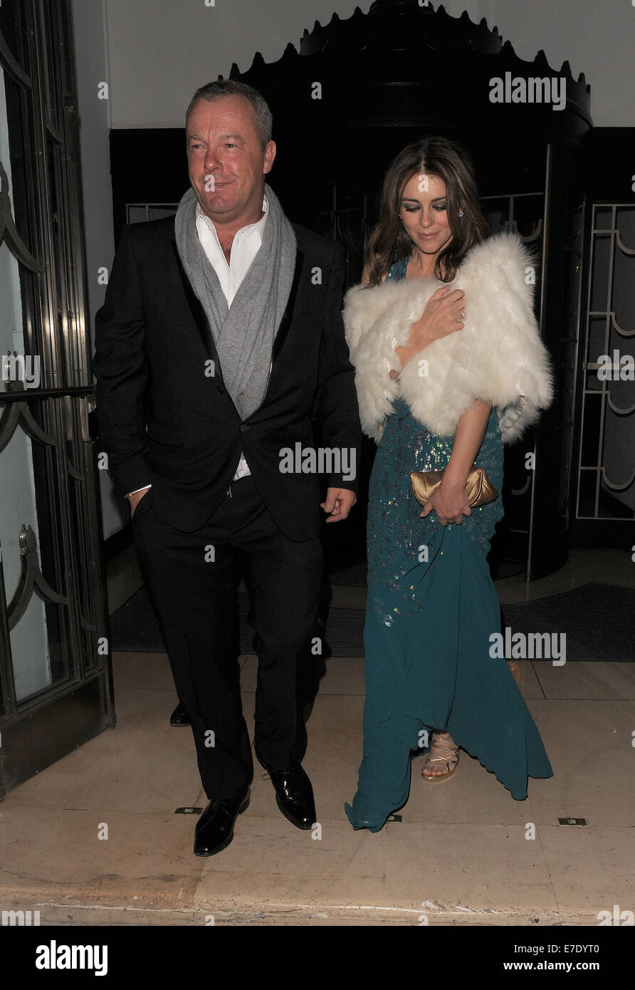 Elizabeth Hurley leaves Claridges hotel with photographer David Yarrow ...