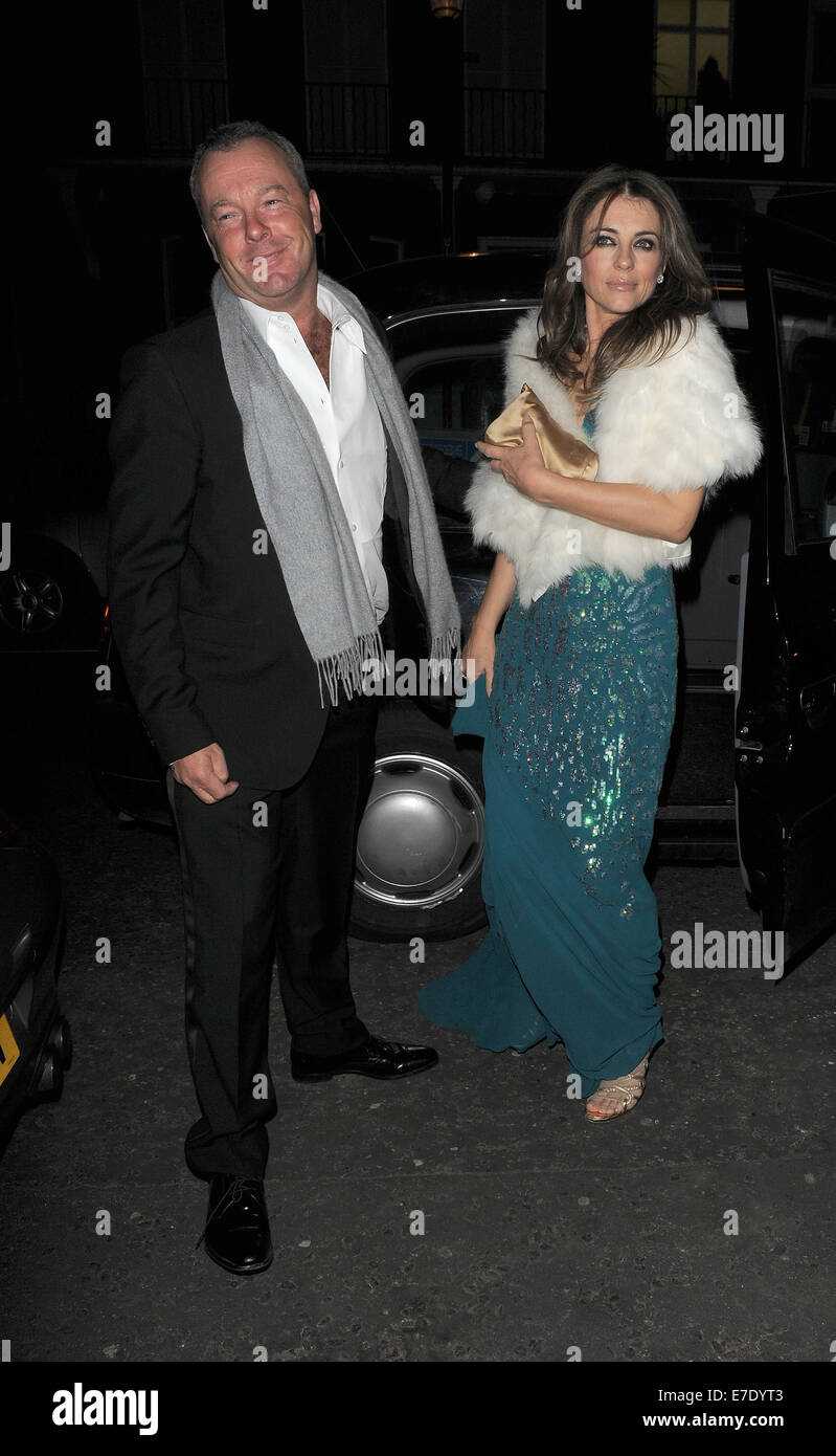 Elizabeth Hurley leaves Claridges hotel with photographer David Yarrow ...