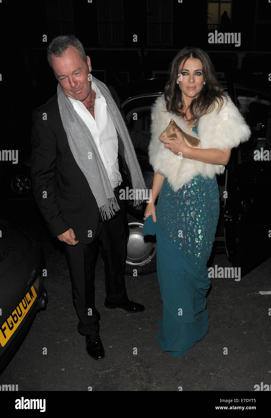 Elizabeth Hurley leaves Claridges hotel with photographer David Yarrow ...