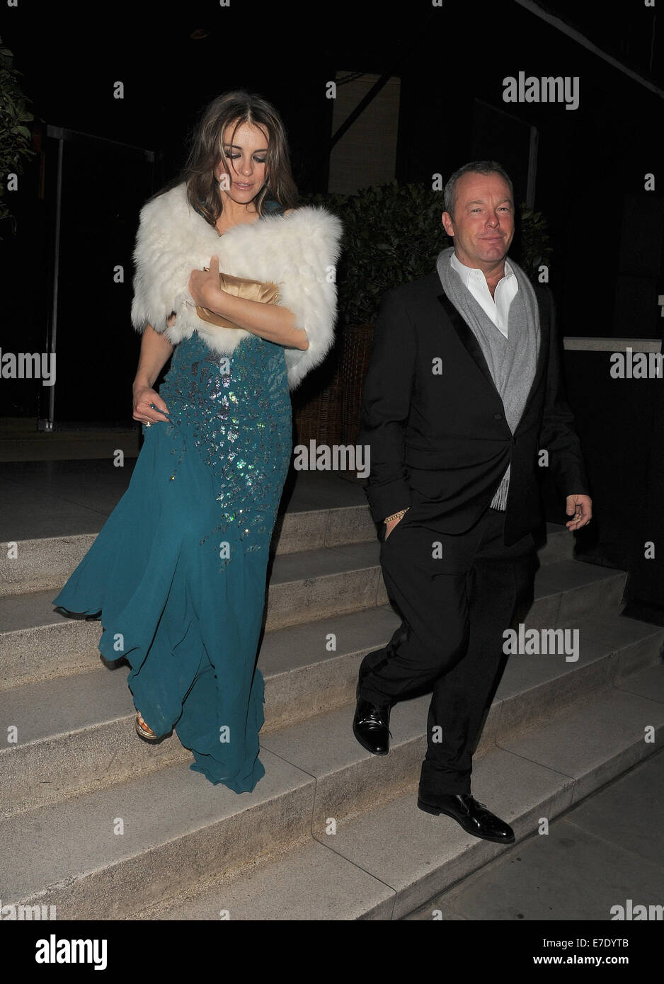 Elizabeth Hurley leaves Claridges hotel with photographer David Yarrow ...