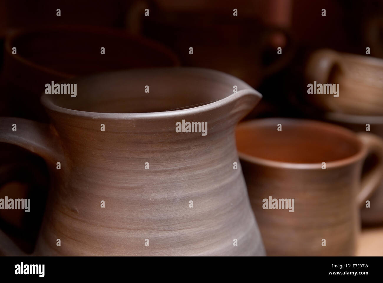 Many handmade old clay pots on the shelf Stock Photo - Alamy