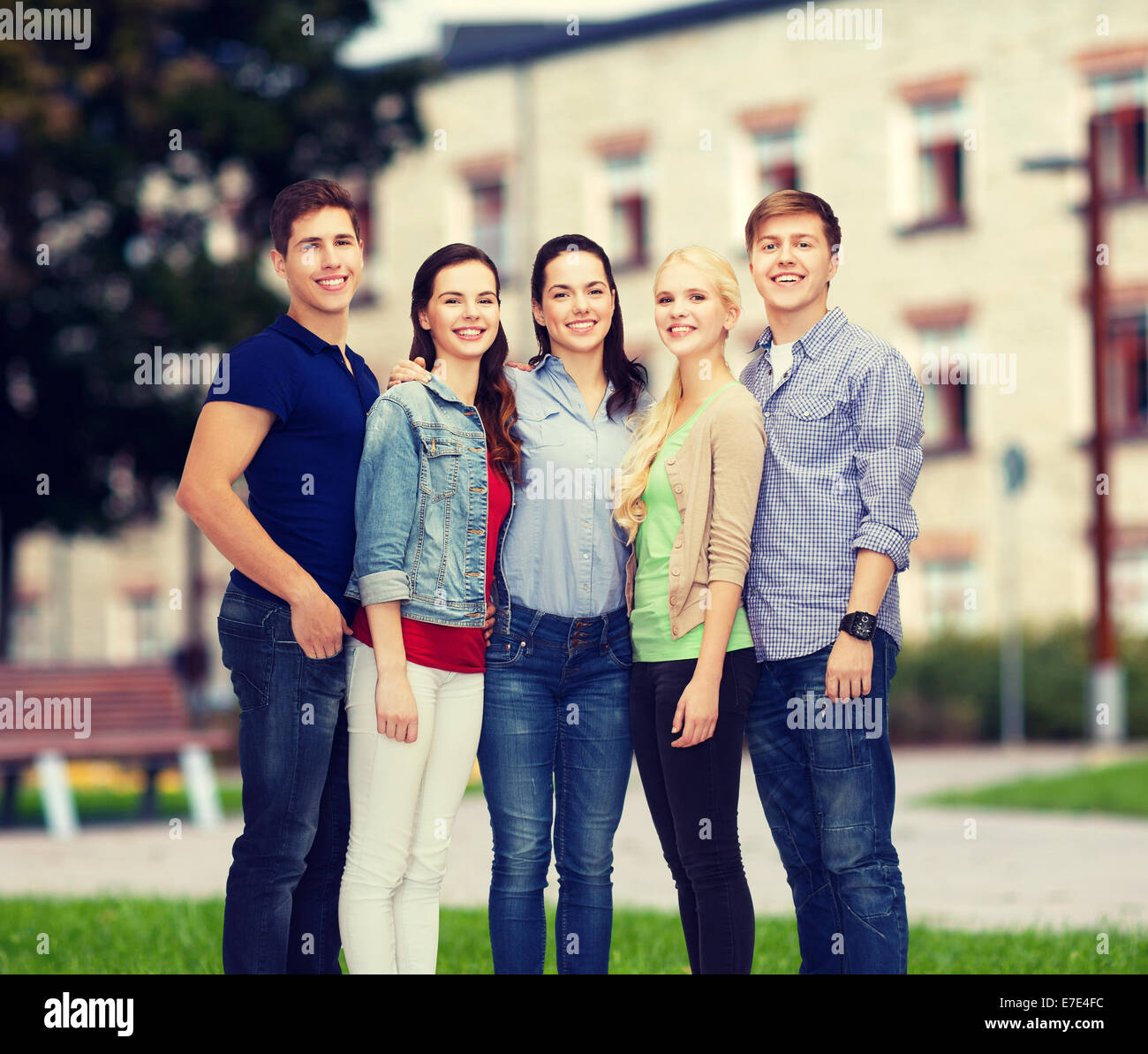 group of smiling students standing Stock Photo - Alamy