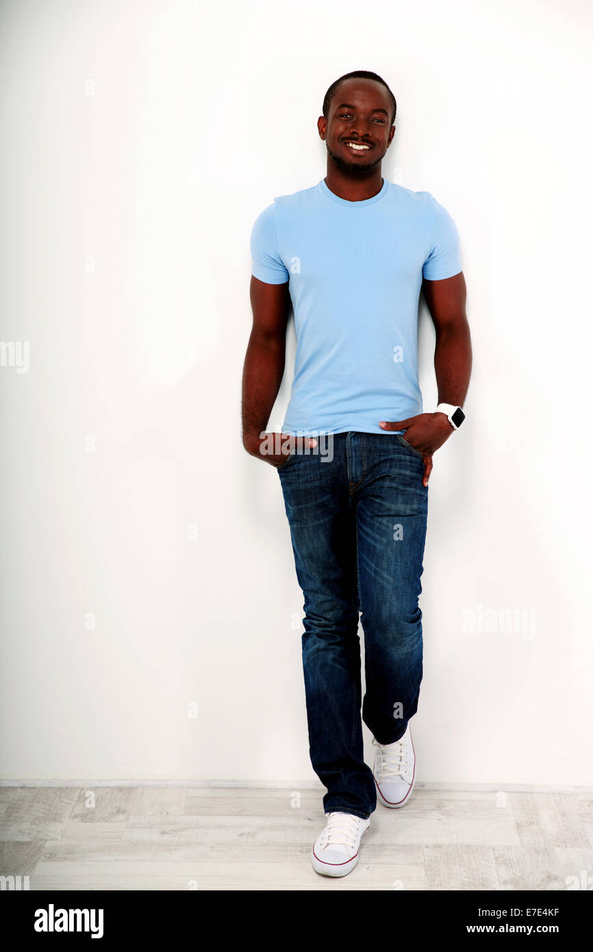 Full length portrait of a smiling african man Stock Photo - Alamy