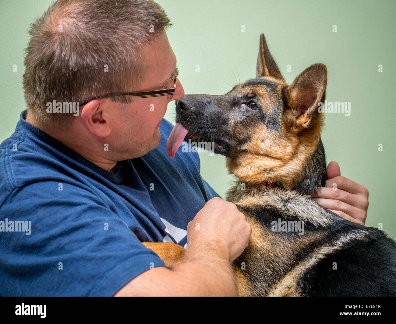 Man german shepherd hi-res stock photography and images - Alamy