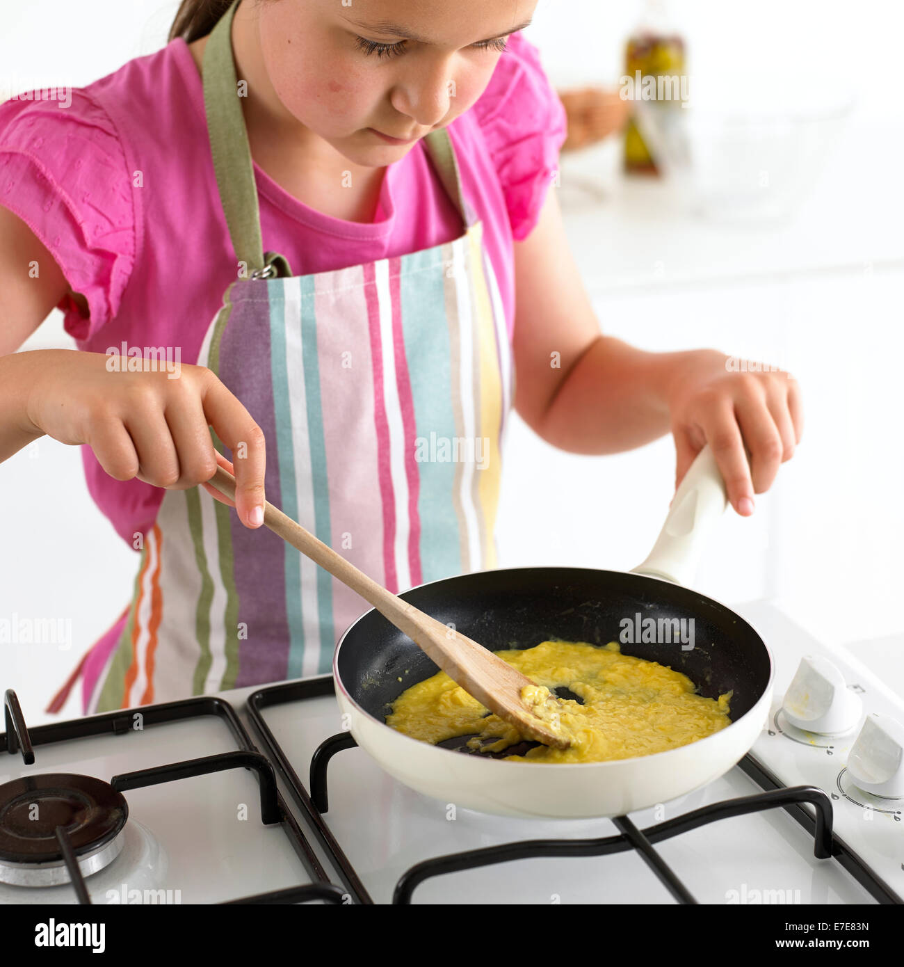 Person making scrambled eggs hi-res stock photography and images - Alamy