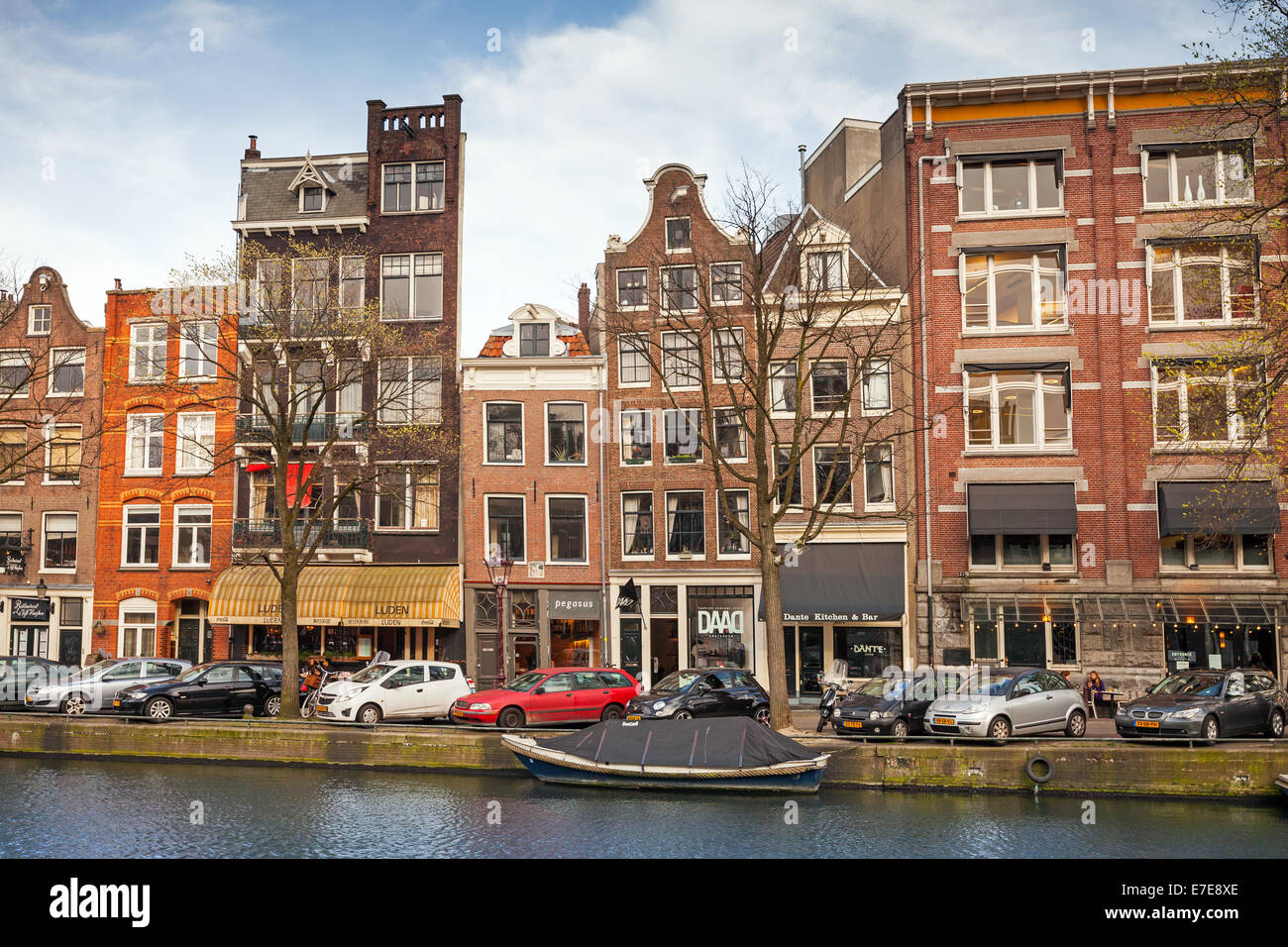 AMSTERDAM, NETHERLANDS - MARCH 19, 2014: Colorful living houses along ...