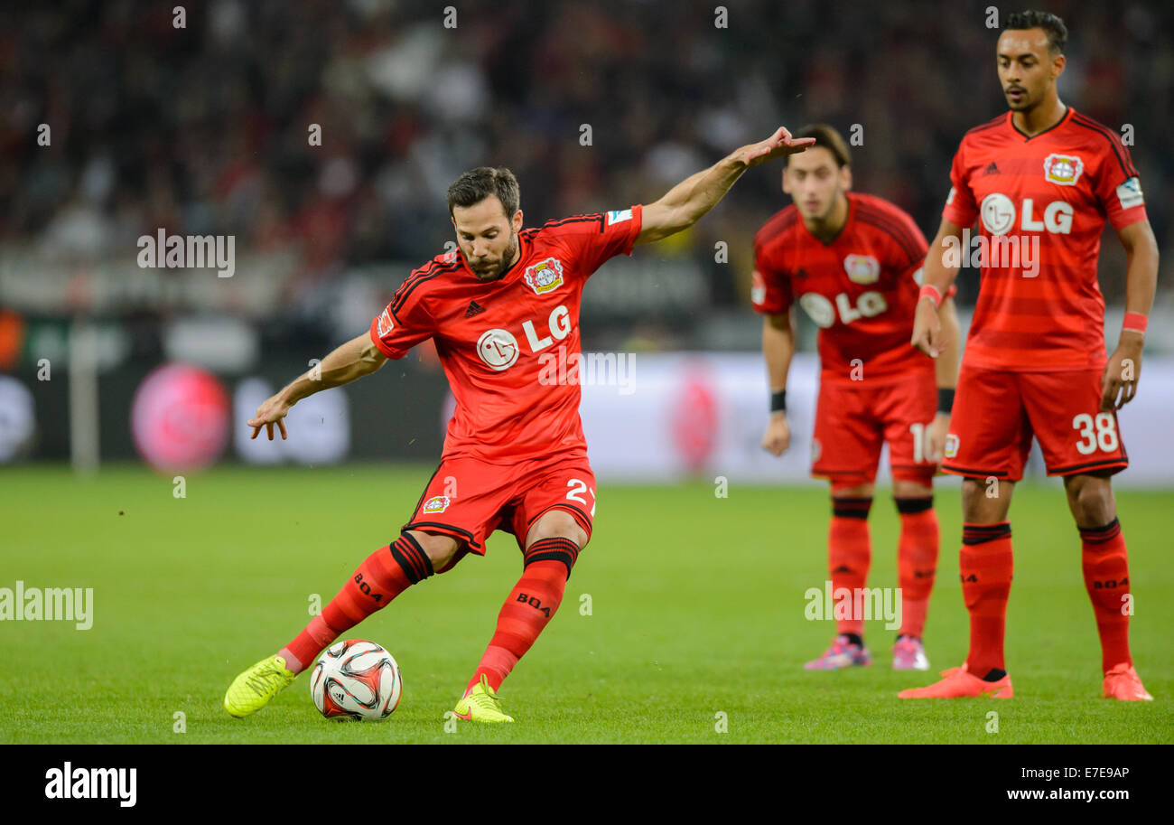 Leverkusen's controls the ball Gonzalo Castro as his teammates Karim ...