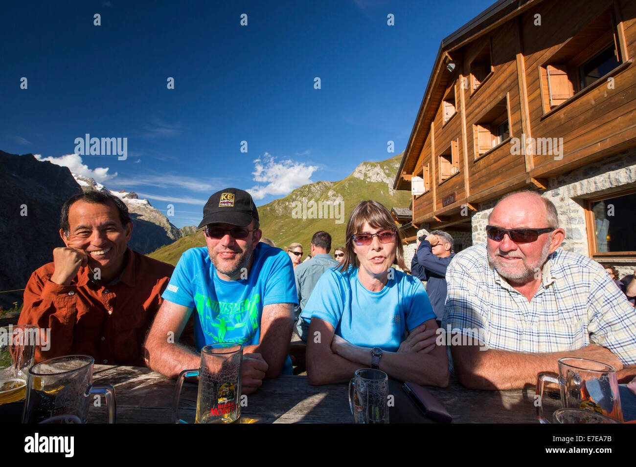 Walkers doing the Tour Du Mont Blanc outside the Bonatti Hut opposite ...