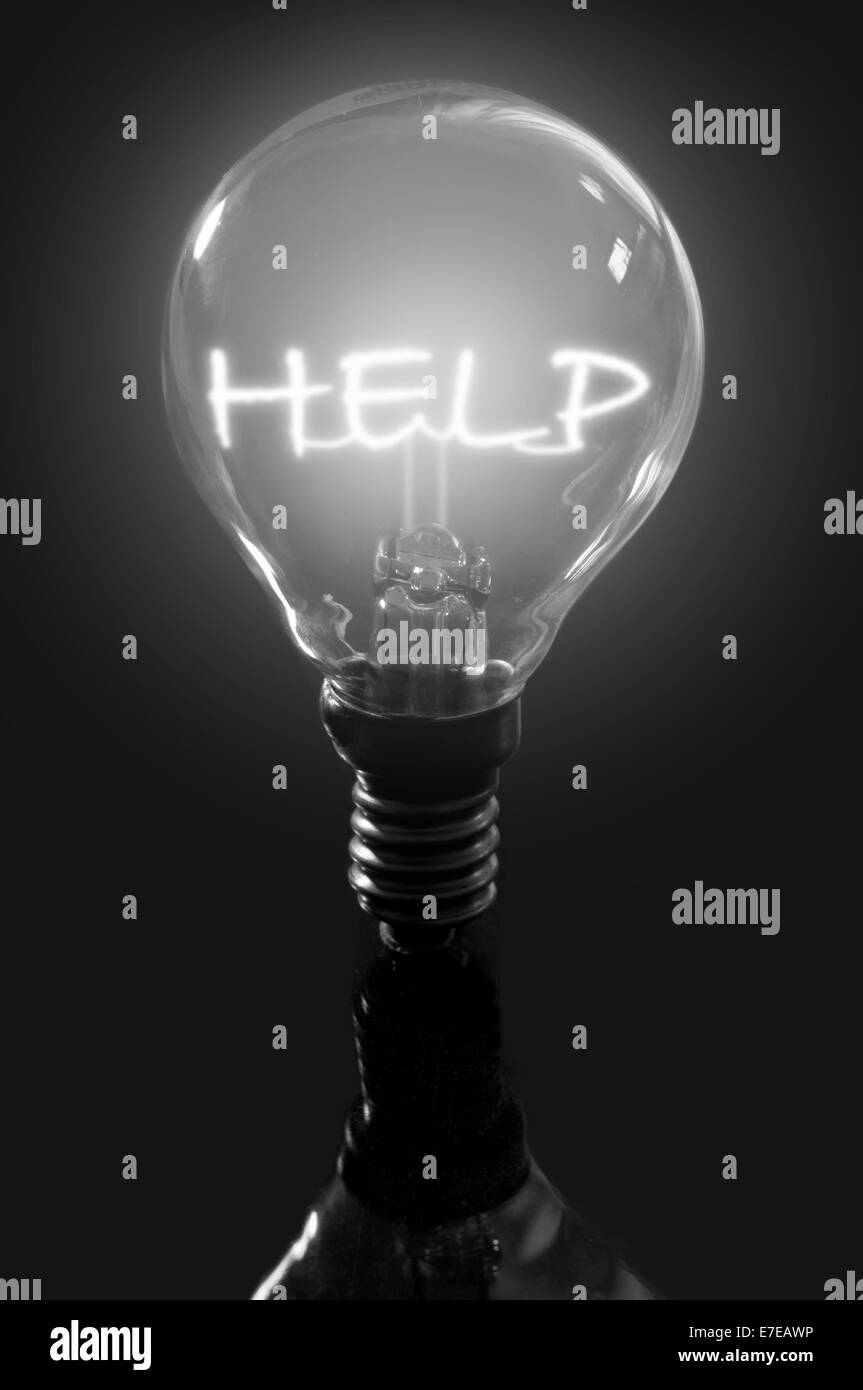 Illuminated help concept light bulb Stock Photo - Alamy