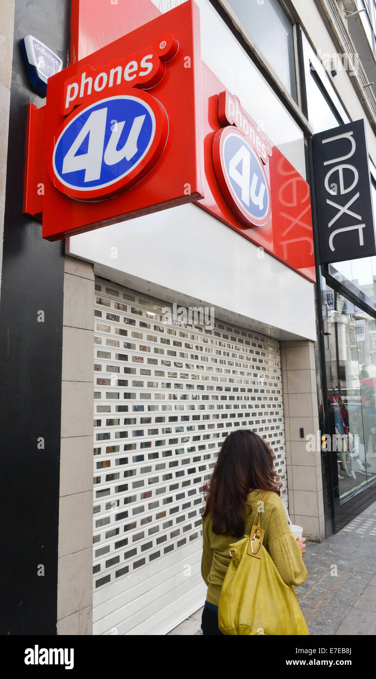 Oxford Street, London, UK. 15th September 2014. The Phones 4u store on Oxford Street is closed ...